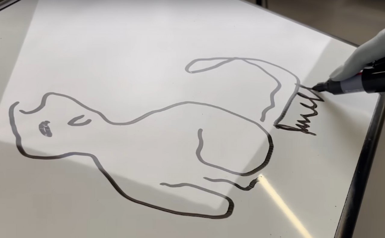 Watch: Humanoid Robot Ameca drawing a Cat like a Child